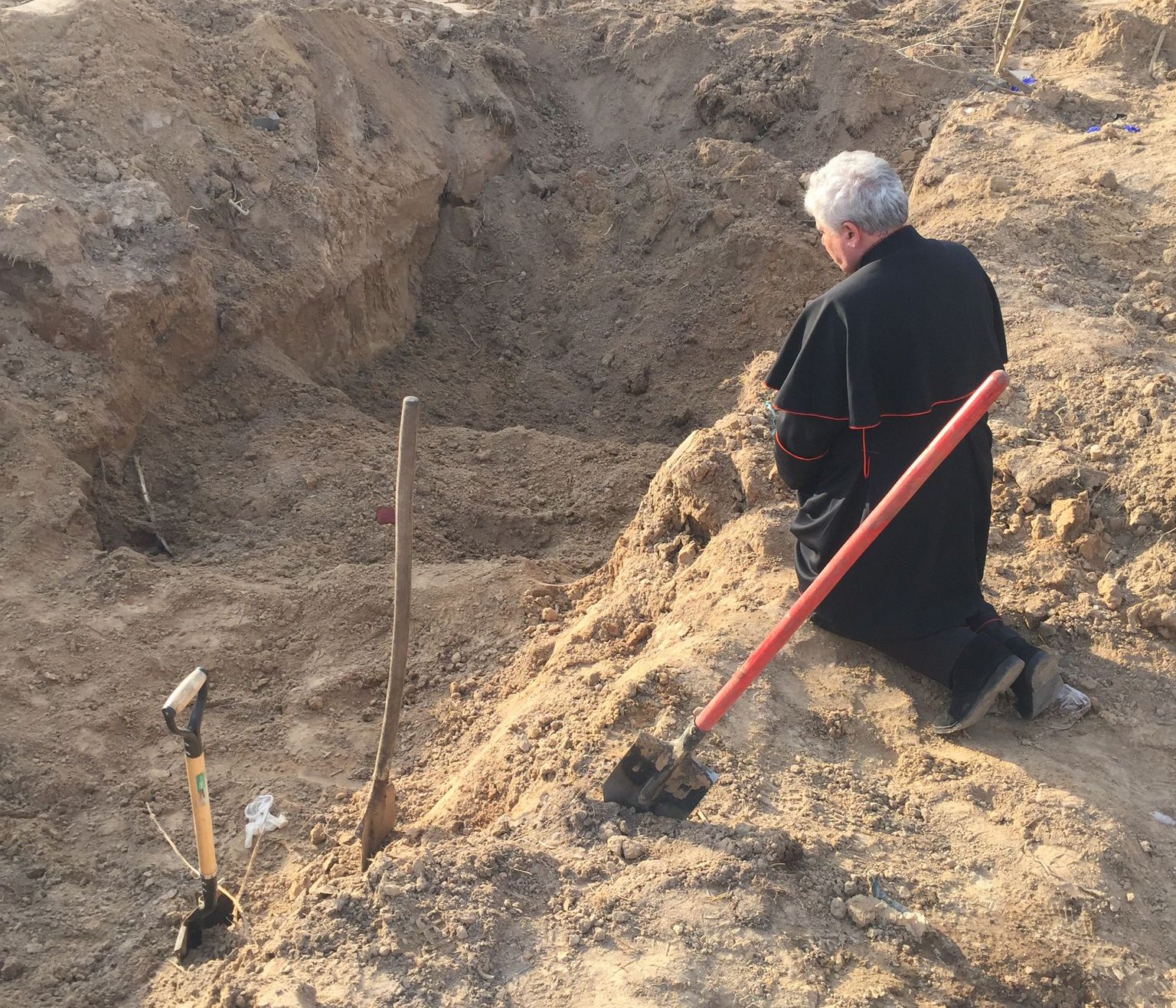 Cardinal Konrad Krajewski Visits Newly Discovered Mass Grave Site in ...